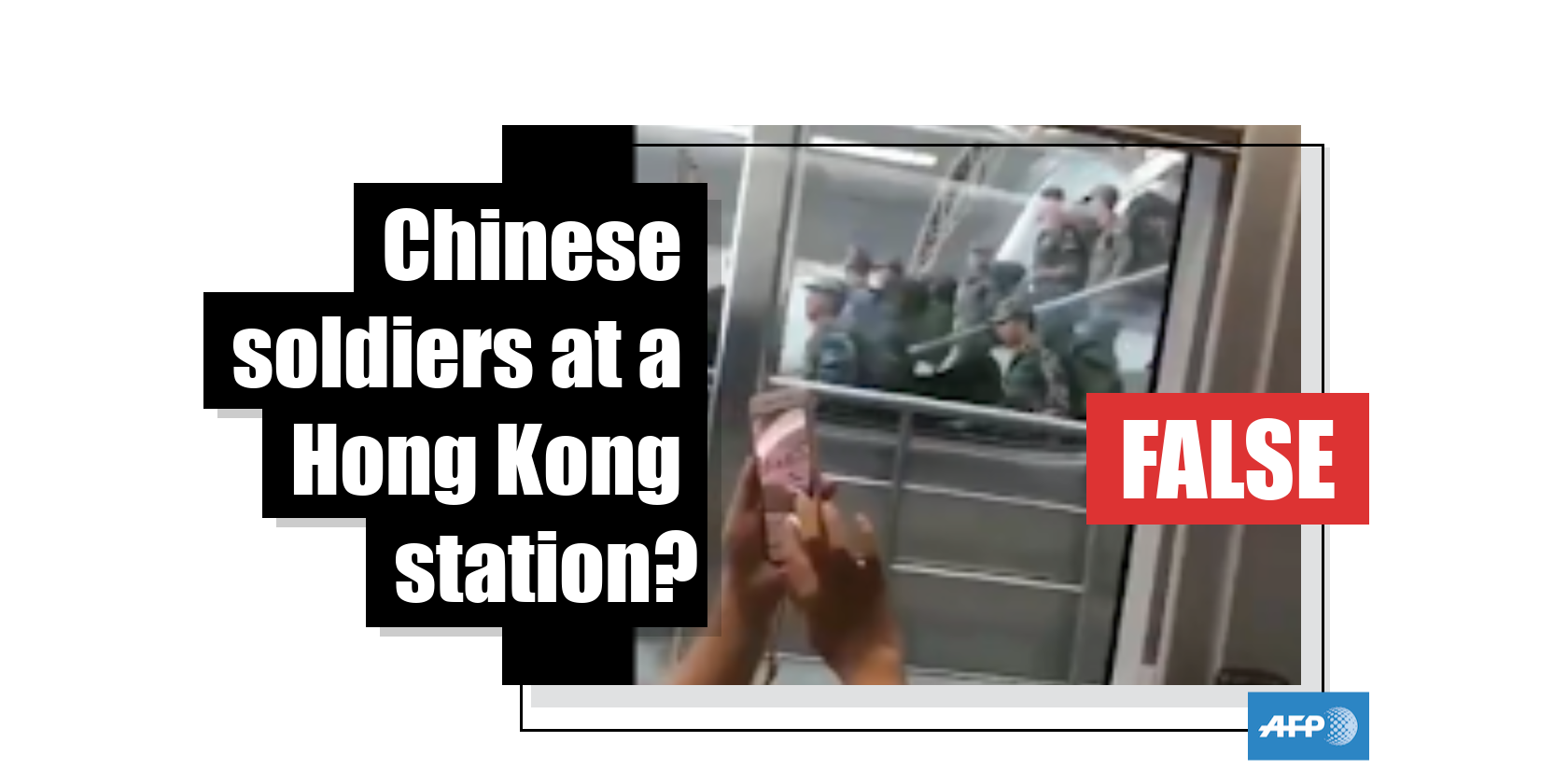 The video shows soldiers at a railway station in Guangzhou, China ...